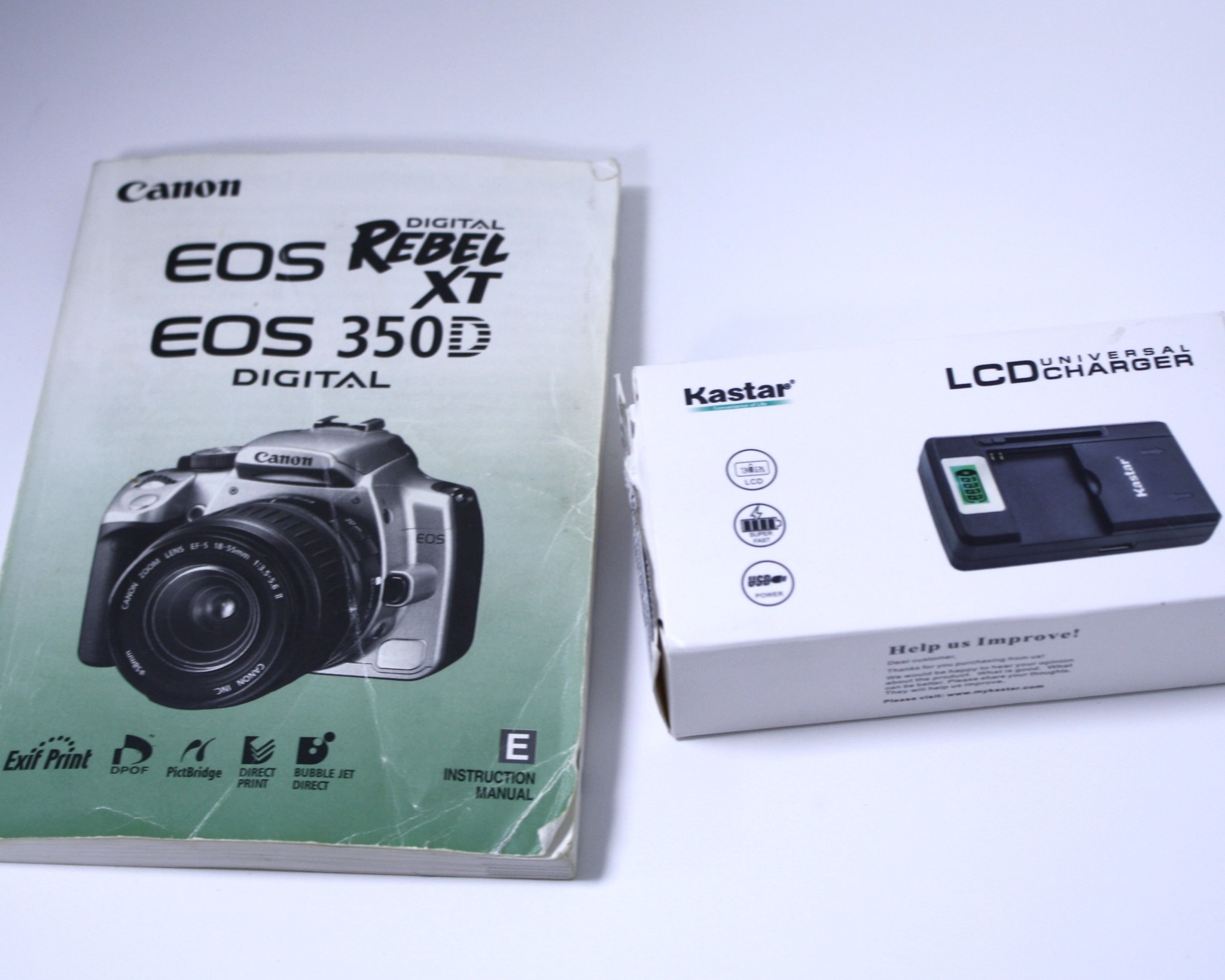 Canon Digital Rebel XTi with 18-55mm w/ charger & battery pack - Camera ...