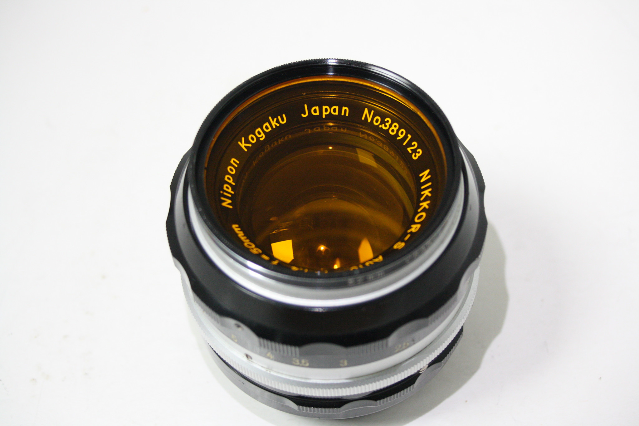 Nikkor-S Auto 50mm f/1.4 lens, with 52mm Unbranded Orange (85A) filter ...