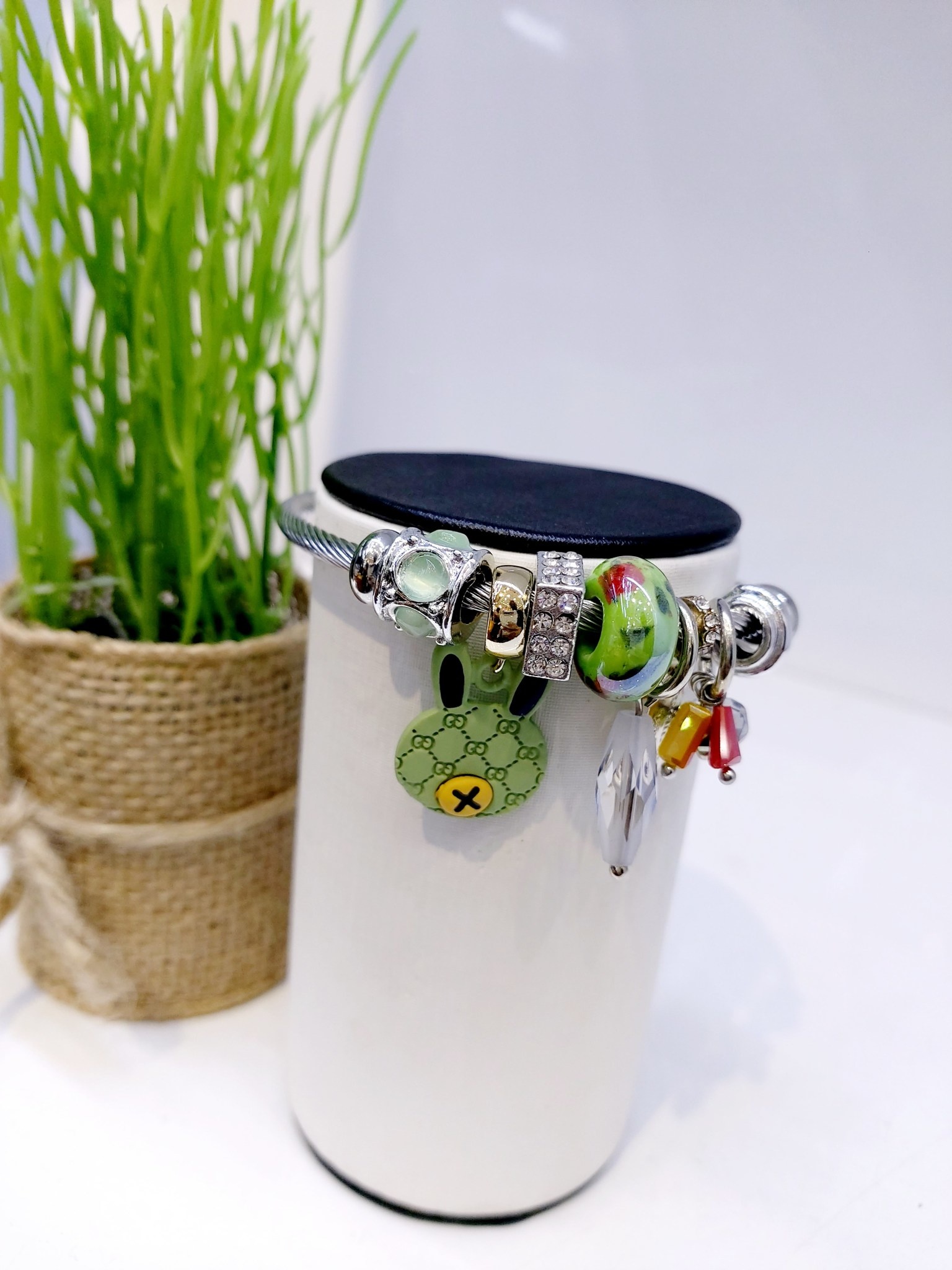 bae0027-green-charm-charm-bracelet.jpg