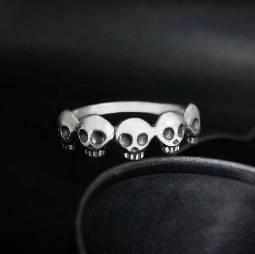 Sterling Silver Five Skull Ring | - Becca