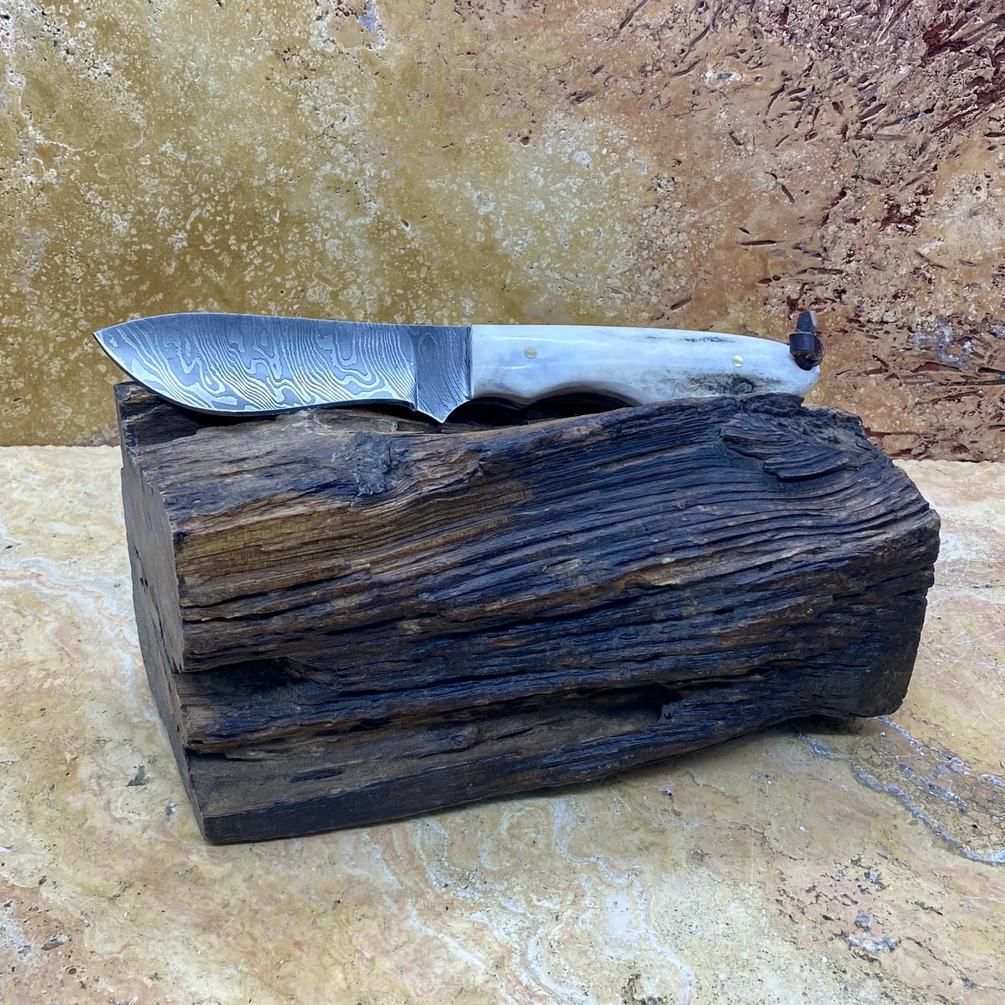 Guide Slab Twist Damascus Knife - White Buffalo