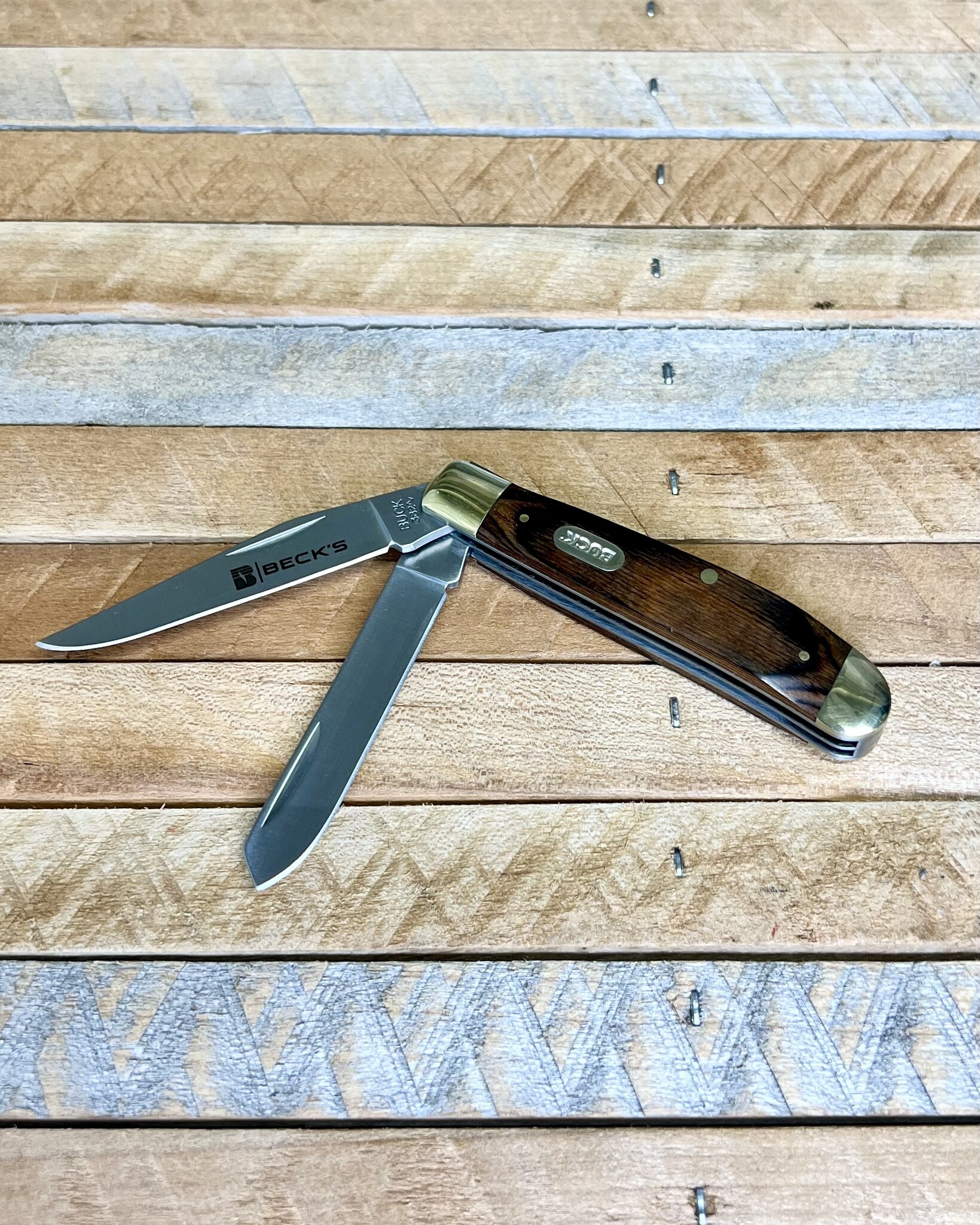 04878 Buck Trapper Woodgrain Knife - Beck's Country Store