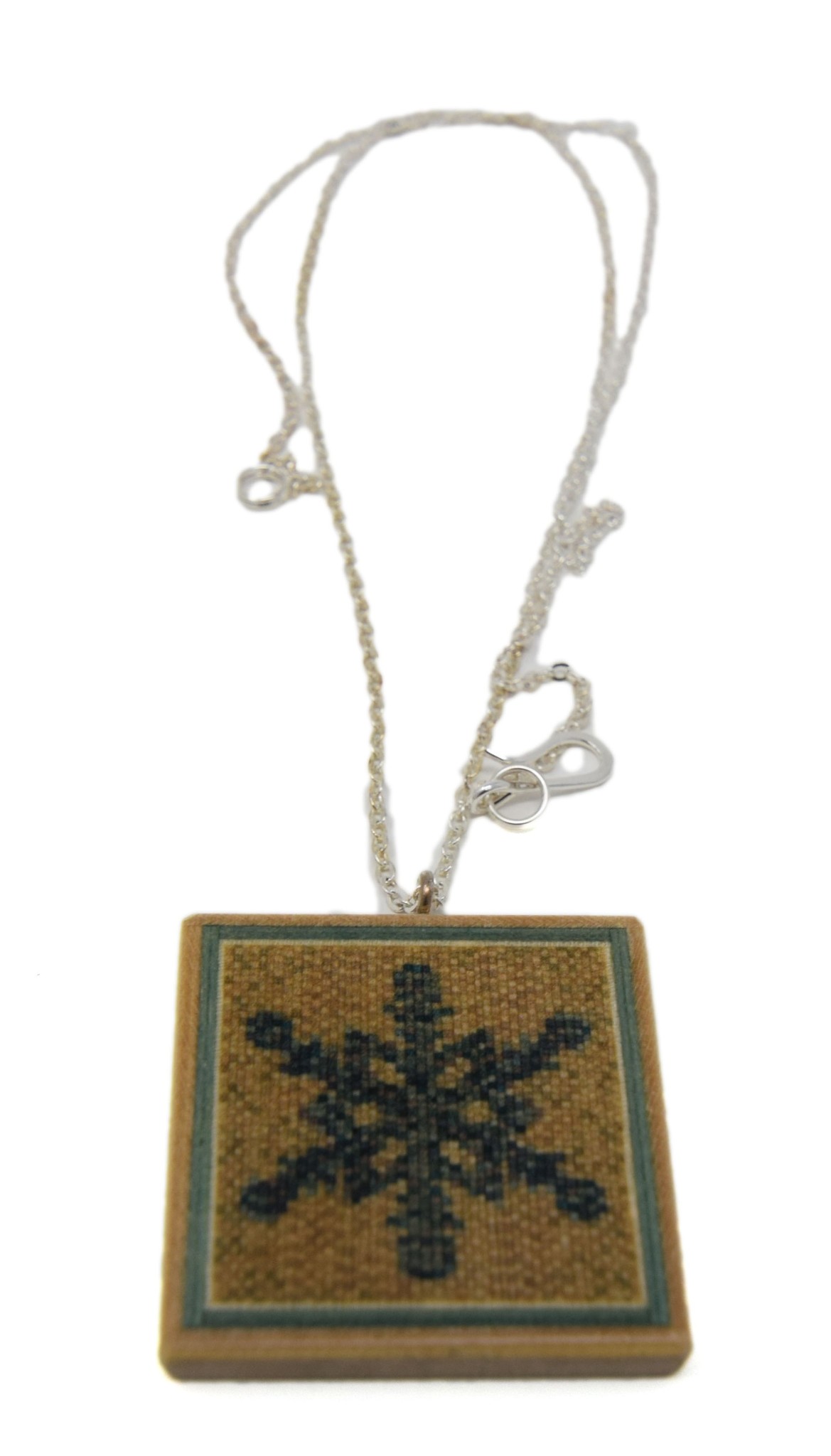 Snowflake Pendants by Buzz Coren - Log House Craft Gallery