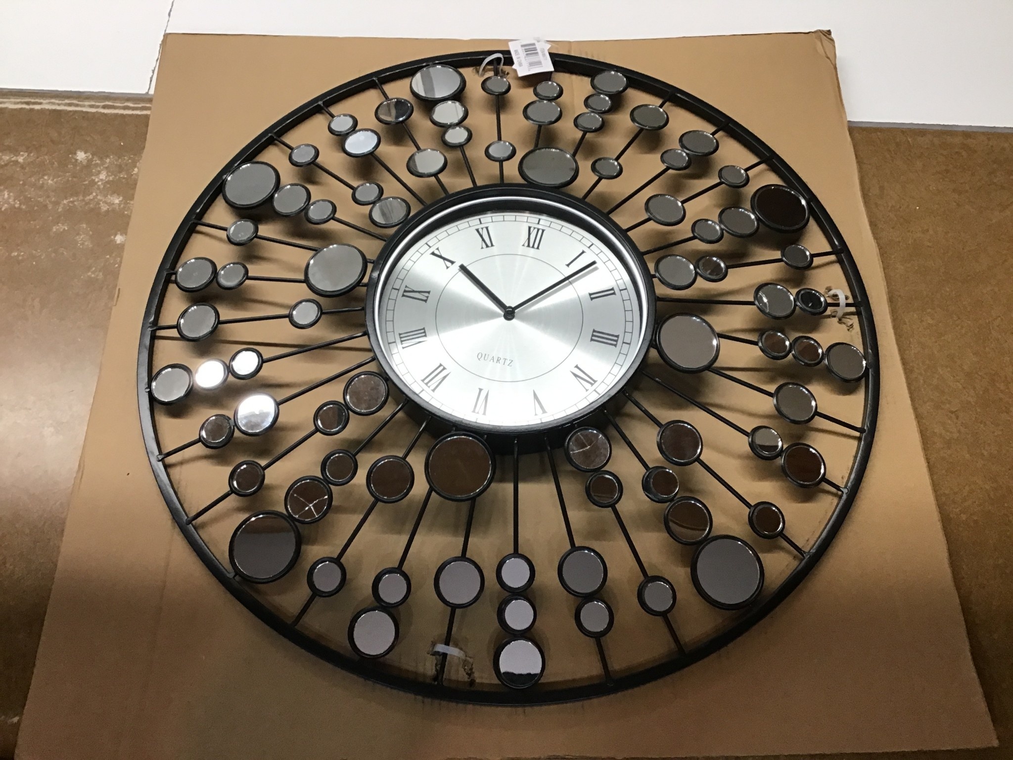 Broken reflectors- DecMode 26 Black Metal Starburst Radial Wall Clock ...
