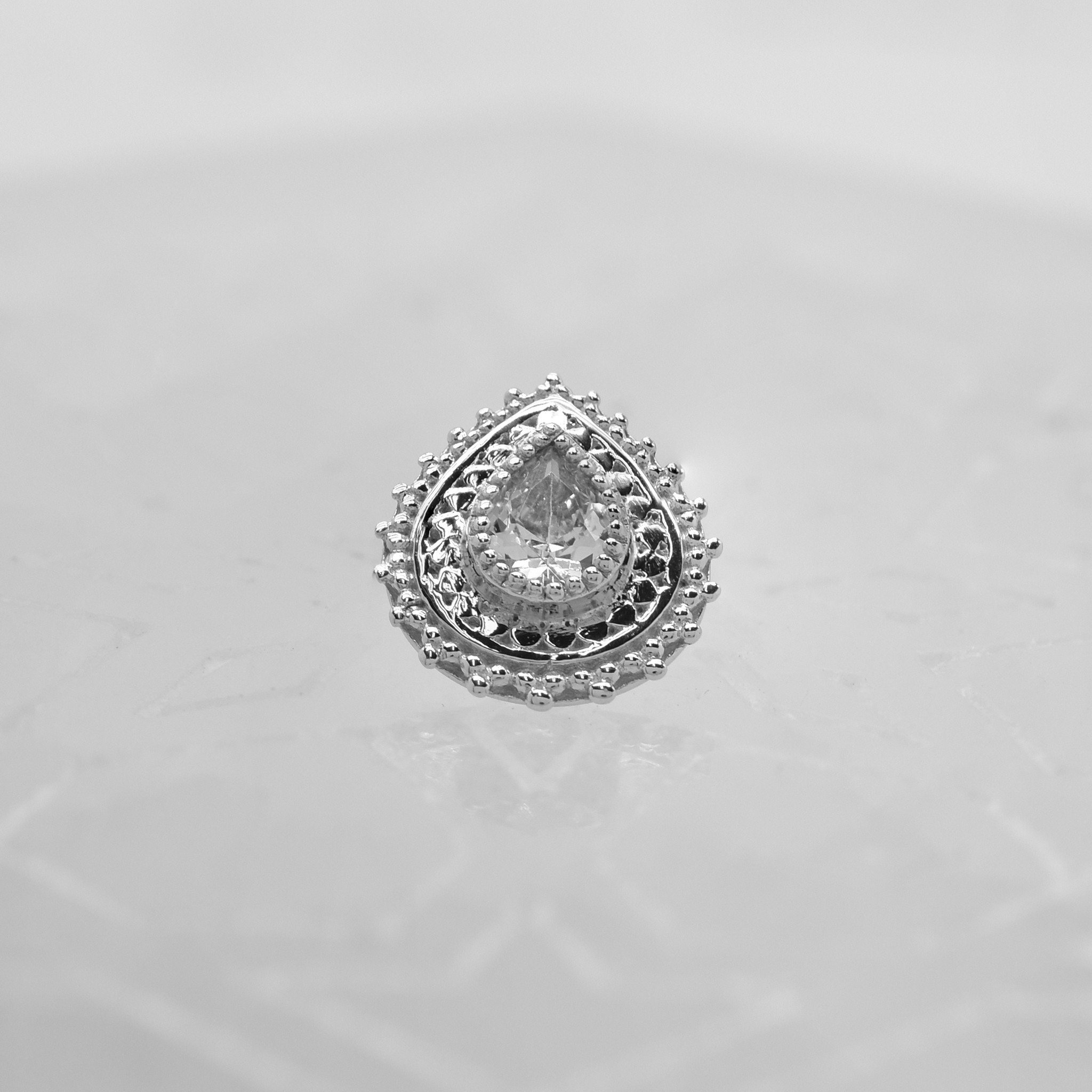 Buddha Jewelry threadless AJA with White Sapphire WG - Enigma ...