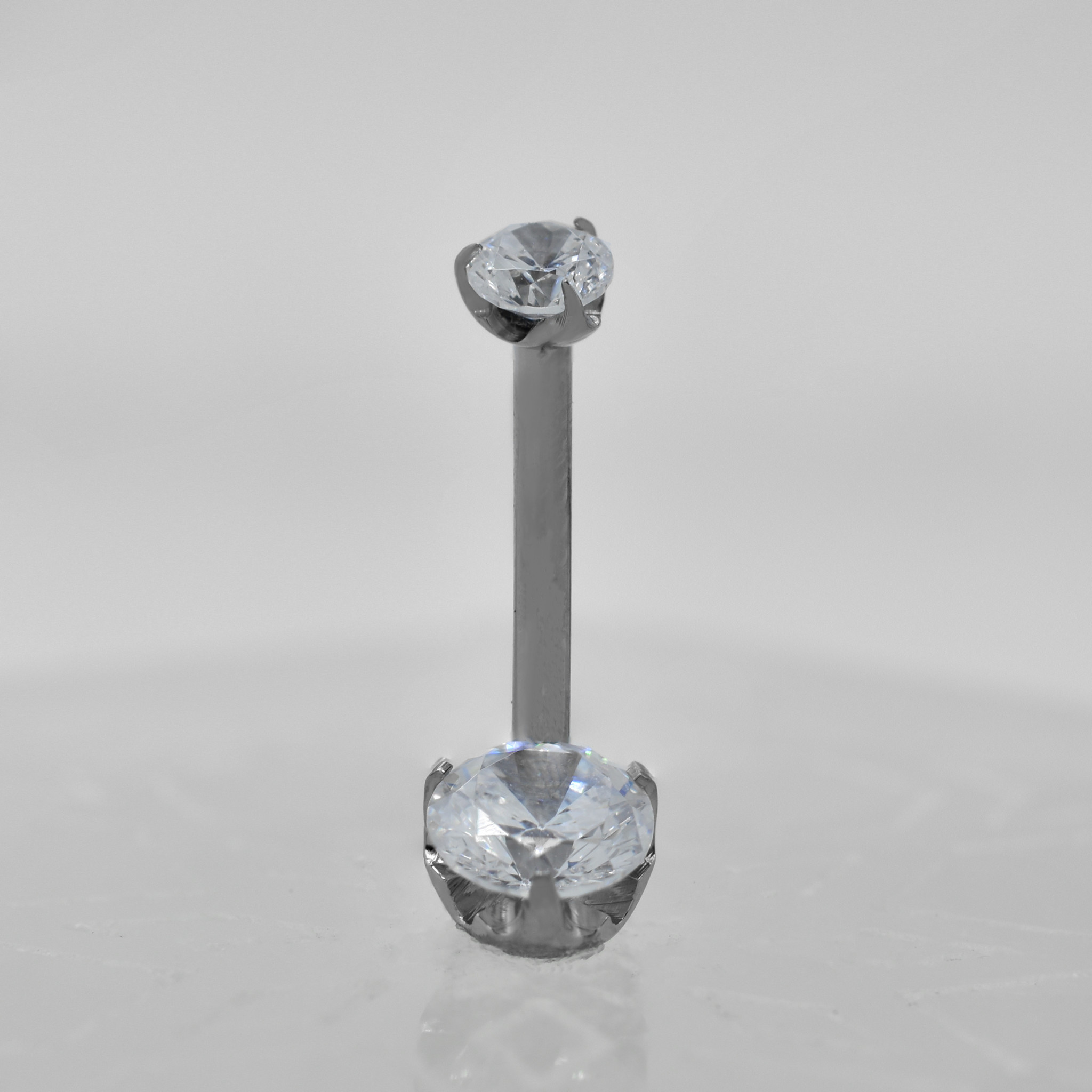 Intrinsic threaded navel curve with 6mm bottom PRONG 14g 5/16” White CZ - Enigma Professional ...