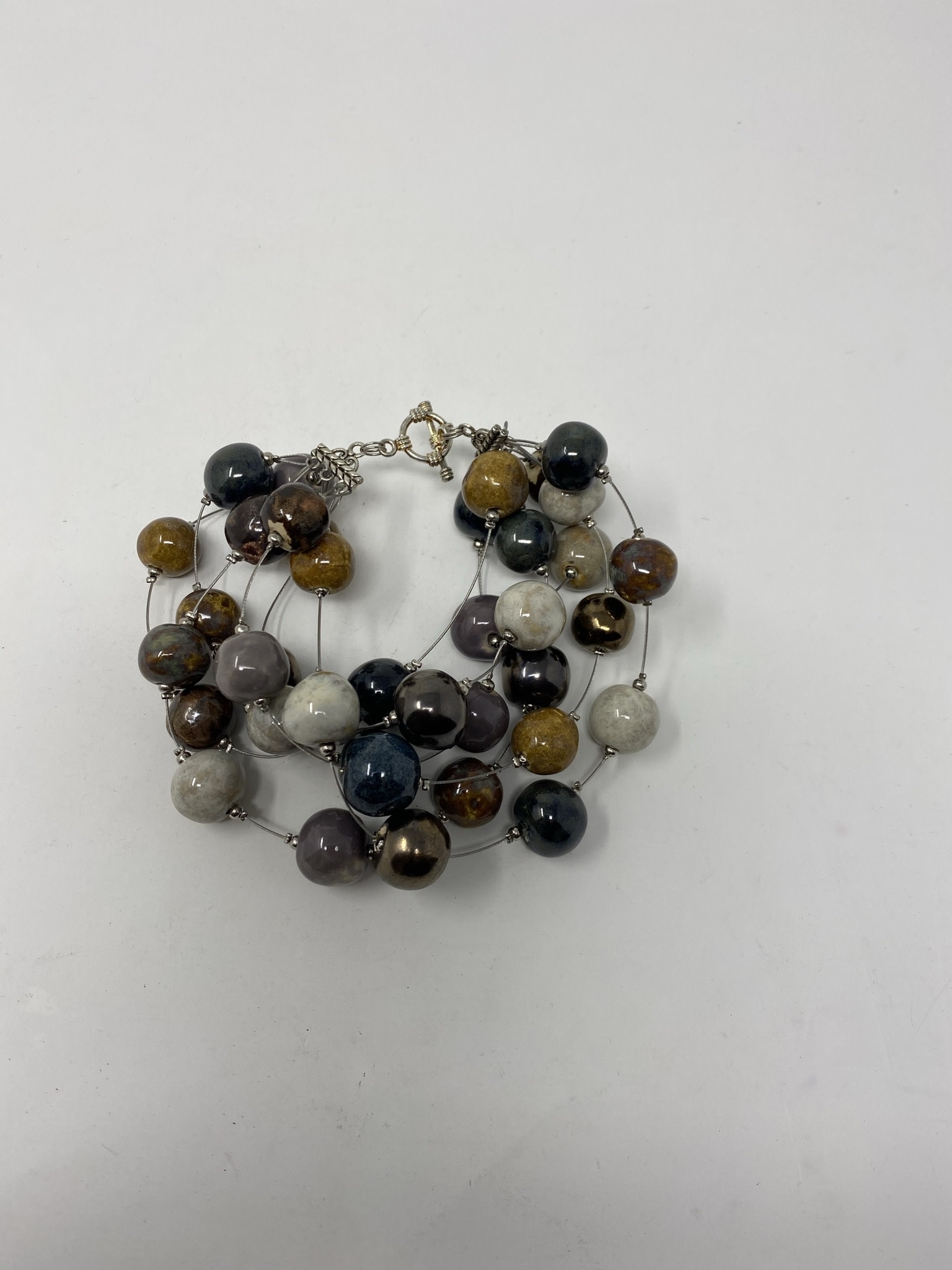 MULTI STRING ROUND BEADED BRACELET - SARAH KUENYEFU COLLECTION