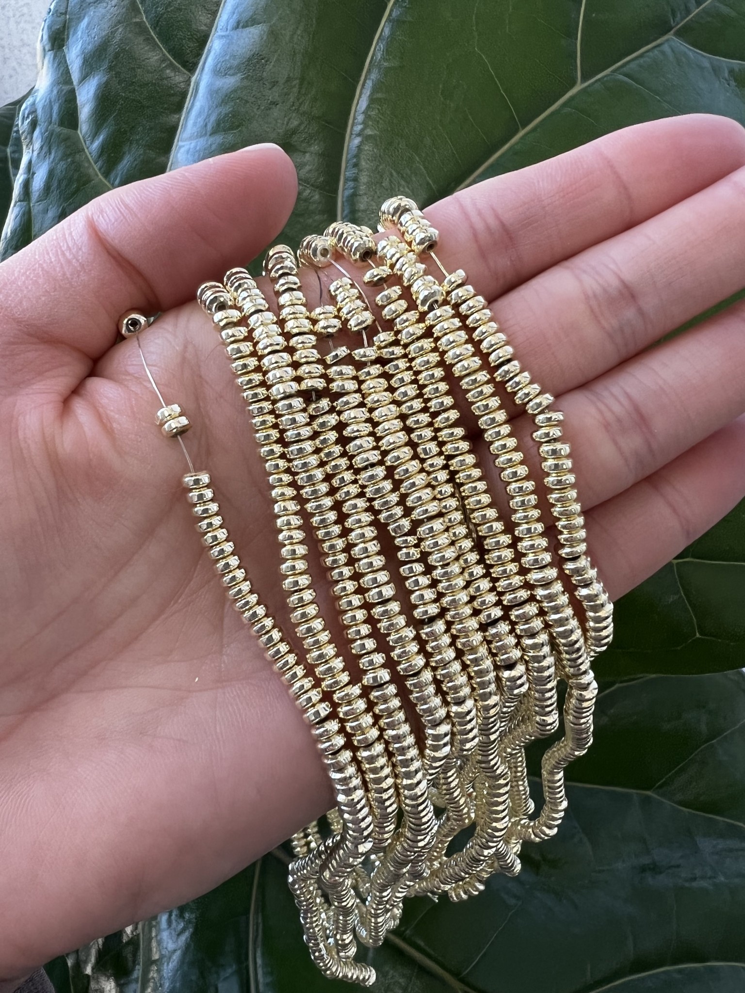 Gold Hematite Rondelle, Polished 15" Strand - The Raw Rock Shop Inc.