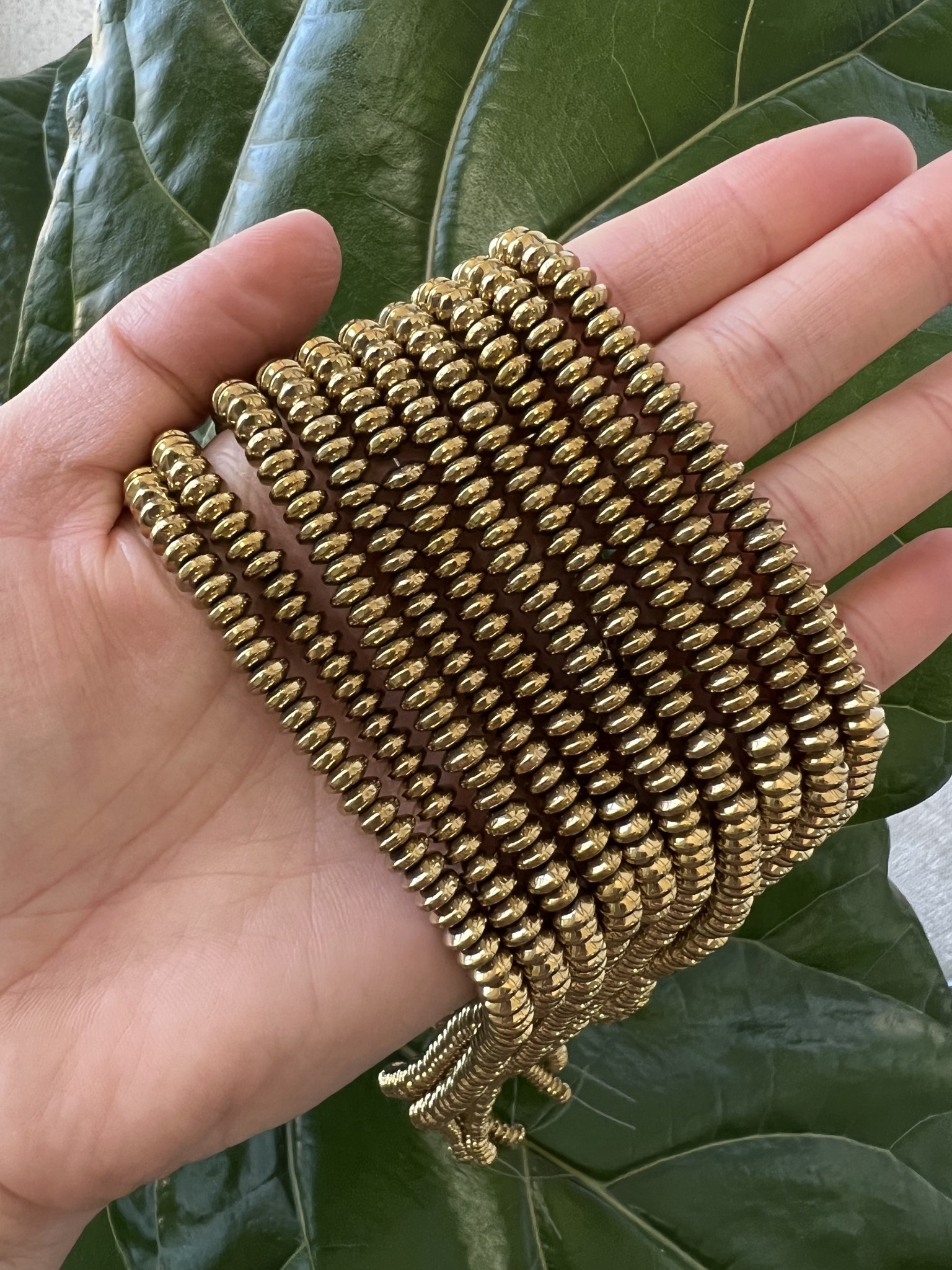 Dark Gold Hematite Rondelle, Polished 15" Strand - The Raw Rock Shop Inc.