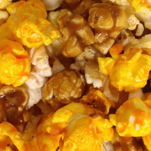 Variety flavors of popcorn, popcorn tins, snow cones, flavored pickles ...