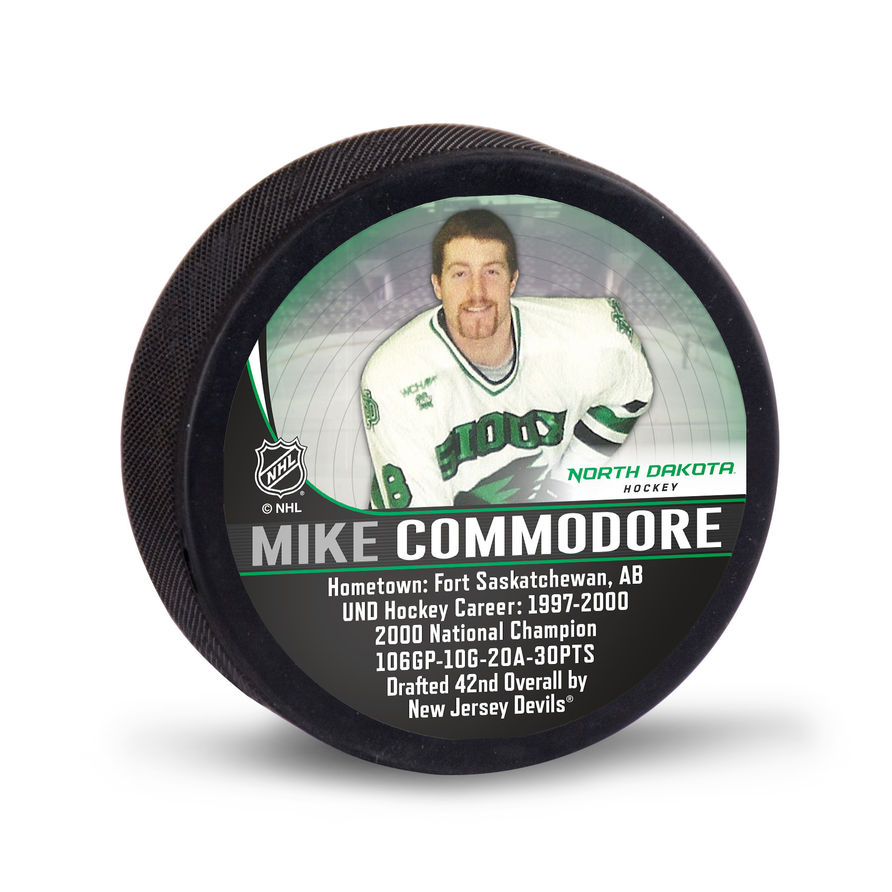 UND Alumni Mike Commodore Puck - Sioux Shop at Ralph Engelstad Arena